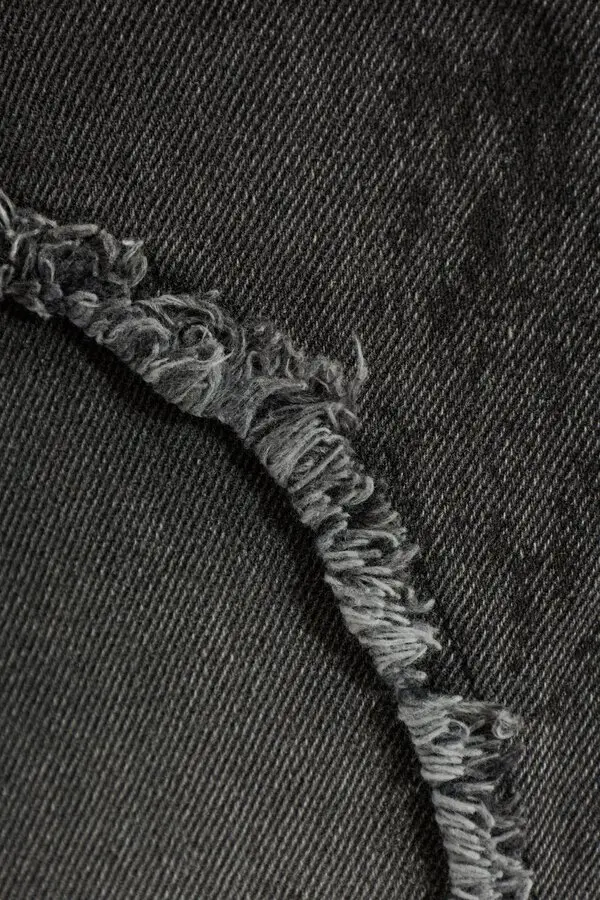 CARNE BOLLENTE Vintage Effect Jeans With Distressed Heart Detail