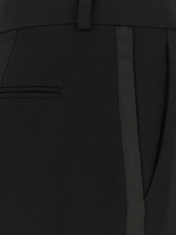 THE ROW Lind Flared Wool Trousers