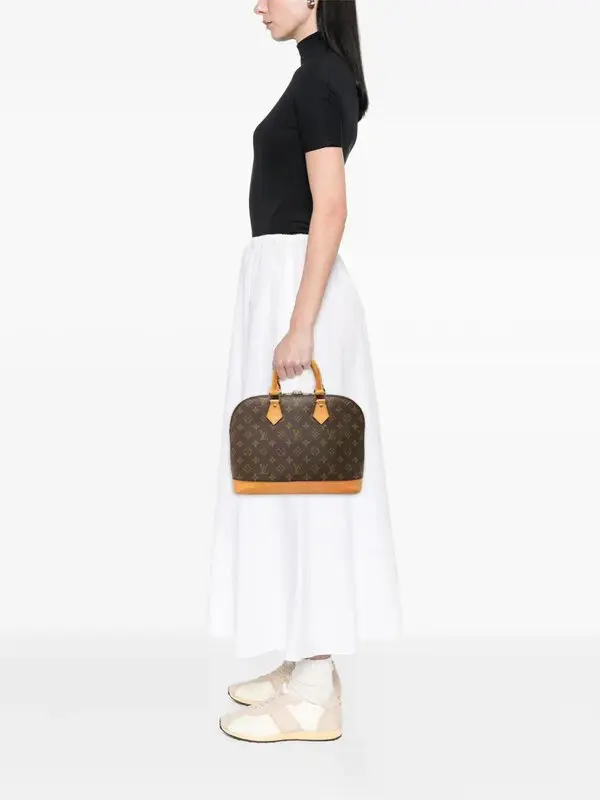 LOUIS VUITTON 2001 Monogram Alma Pm Handbag