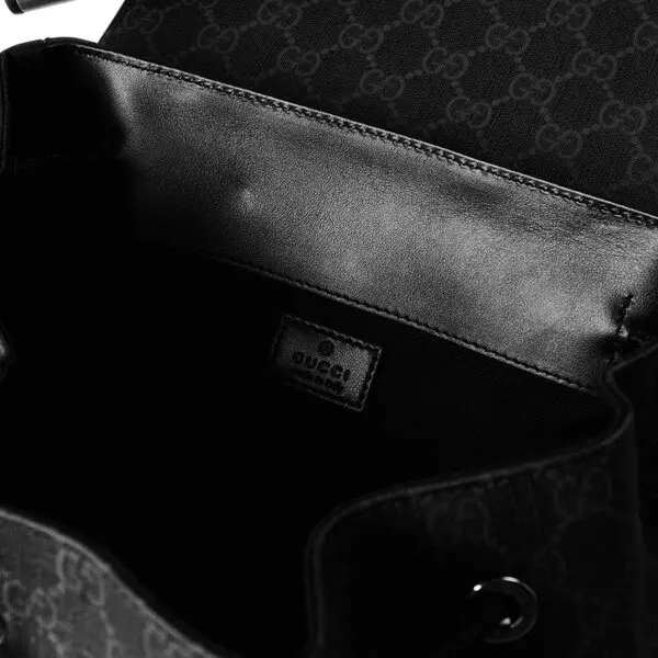 Gucci Monogrammed Backpack With Drawstring Closure
