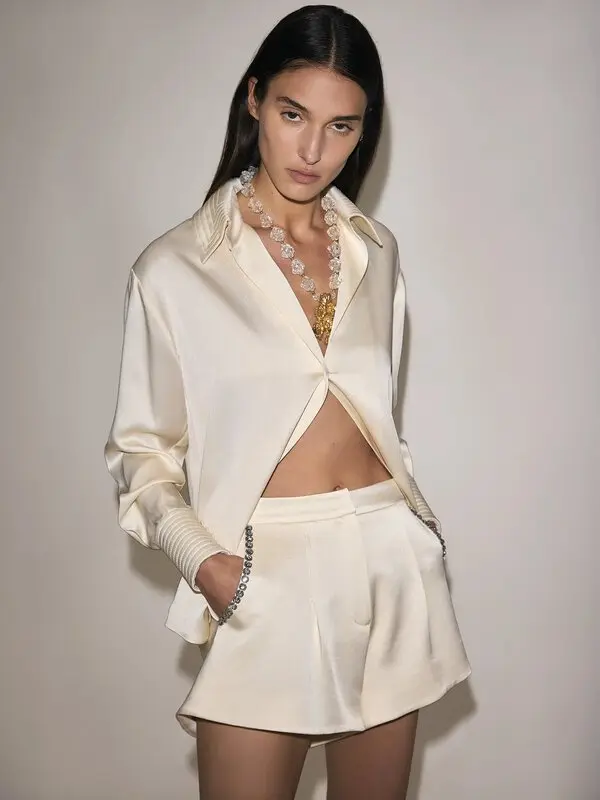 Alexis Circe Tailored High-rise Pleated Shorts With Contrast Trim - Ivory