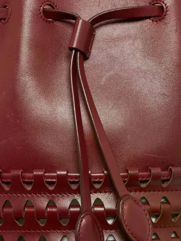 Alaïa Cut-out Drawstring Bucket Bag