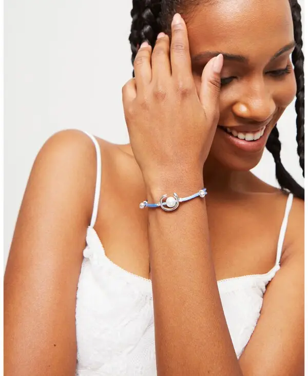 UNODE50 Blue Thread Bracelet With Pearl Shell Trimmings Plated In Sterling