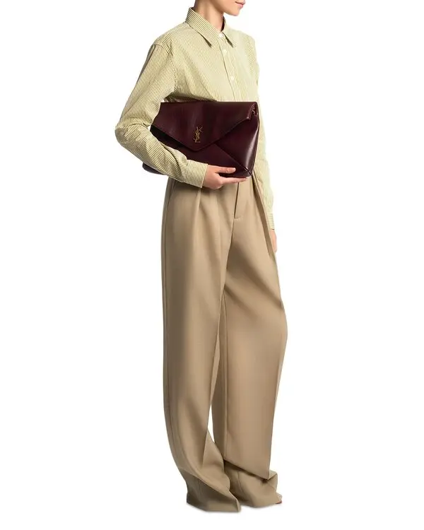 Saint Laurent Cassandre Large Pouch On Chain In Shiny Leather