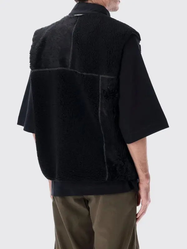 AND WANDER Technical Wool-blend Gilet With High Neck And Zip Pockets