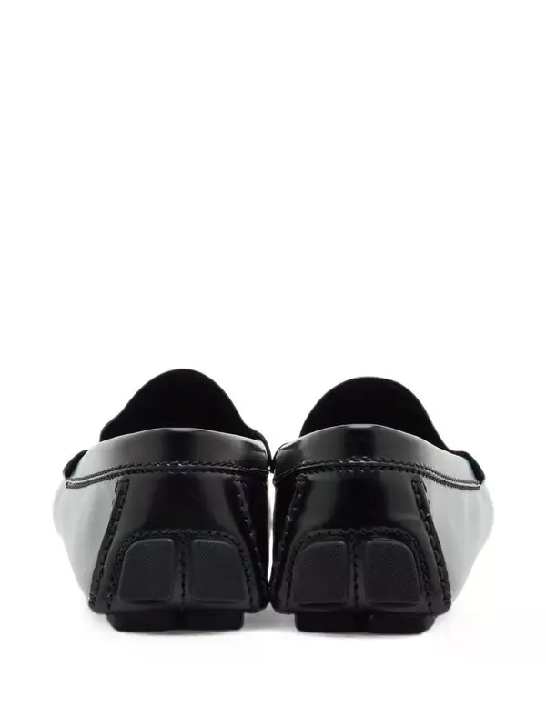 LOUIS VUITTON Logo-embossed Leather Loafers