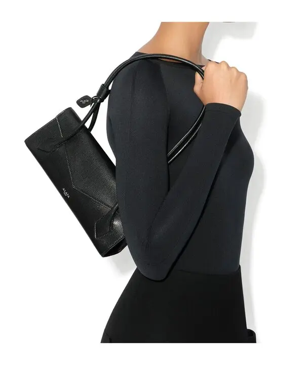 Alaïa Le Teckel Flap Small Bag In Shiny Goatskin