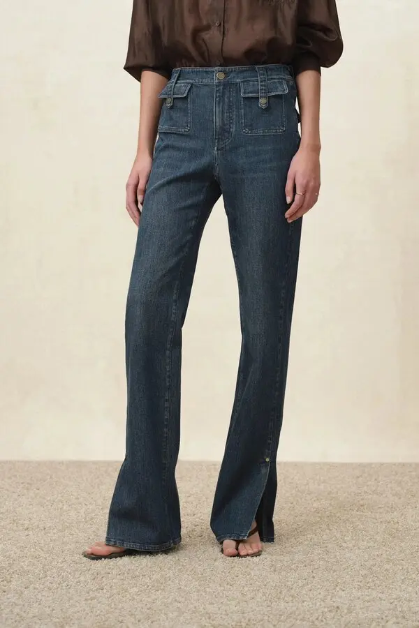 Fabrique Coco Slit Hem Flared Jeans In Cotton Denim