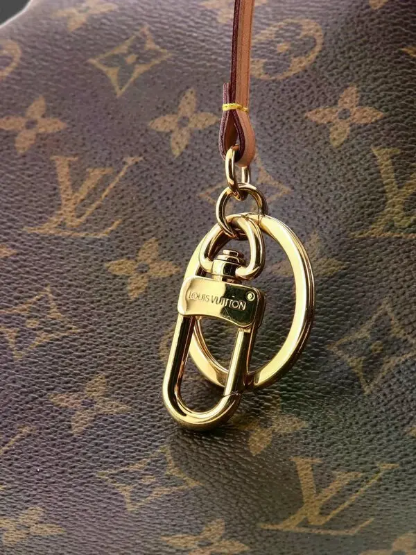 LOUIS VUITTON Artsy Monogram Canvas Mm Hobo Bag - Brown