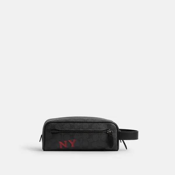 COACH OUTLET Travel Kit In Signature Canvas With Patches