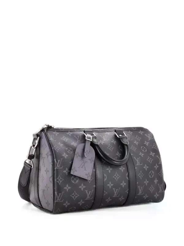 LOUIS VUITTON Keepall Bandouliere Bag Reverse Monogram Eclipse Canvas 35 Travel Bag - Black