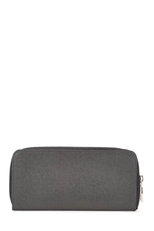 LOUIS VUITTON Taiga Zippy Vertical Wallet