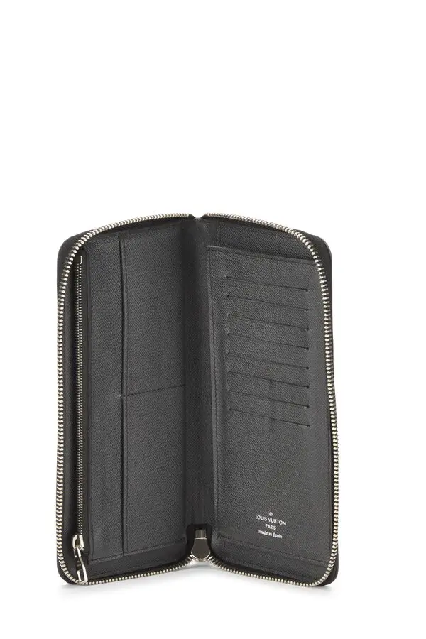 LOUIS VUITTON Taiga Zippy Vertical Wallet