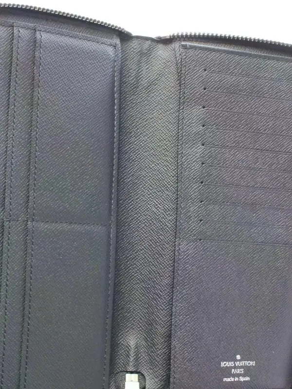 LOUIS VUITTON Monogram Eclipse Zippy Patterned Wallet