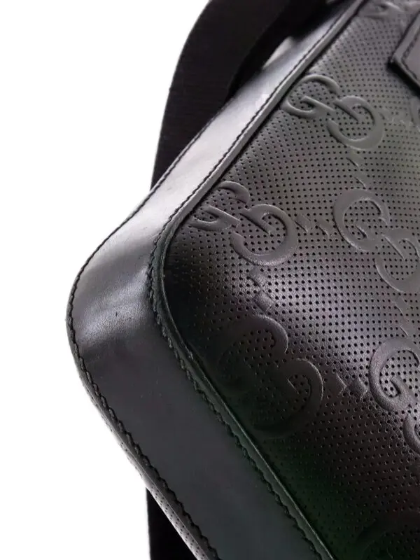 Gucci Gg Embossed Perforated Leather Messenger Bag