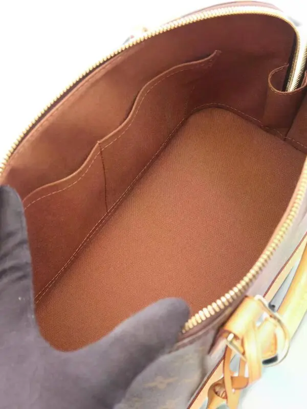 LOUIS VUITTON 2015 Alma Monogram Handbag
