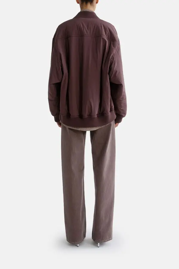 AGOLDE Arc Criss Cross Jeans In Mauvine