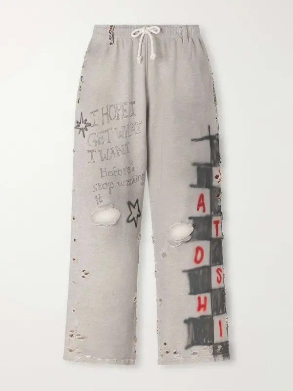 SATOSHI NAKAMOTO Get What I Want Printed Embellished Distressed Cotton-jersey Sweatpants - Gray