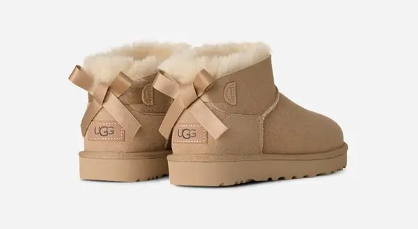 UGG Ultra Mini Bailey Bow Sheepskin Classic Boots - Sand