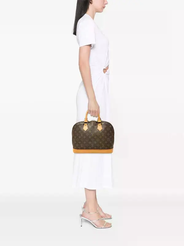 LOUIS VUITTON 1994 Monogram Alma Pm Handbag - Brown