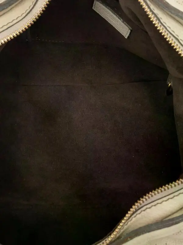 LOUIS VUITTON 2009 Monogram Mahina Xs Crossbody Bag