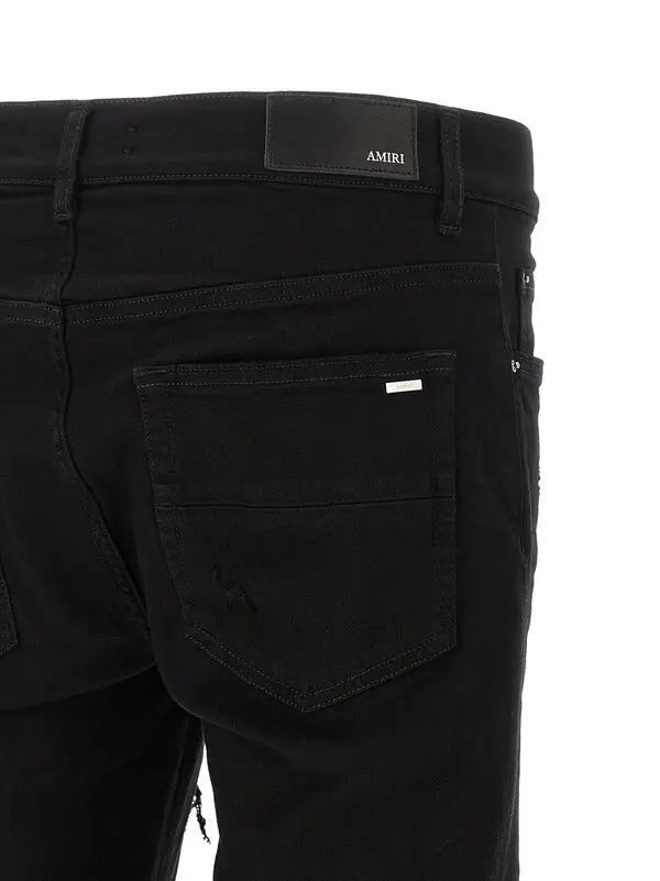 Amiri Mx1' Jeans With Distressed Details