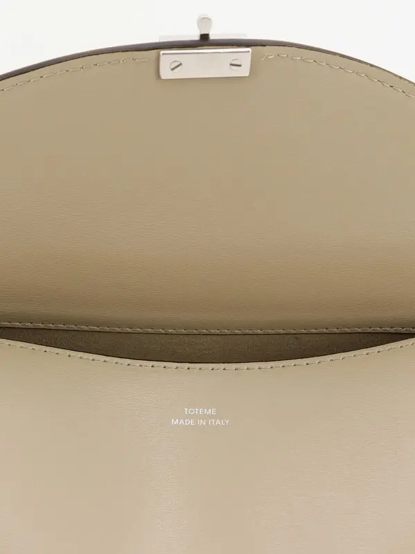 TOTEME Tlock Hammered Leather Crossbody Bag - Beige
