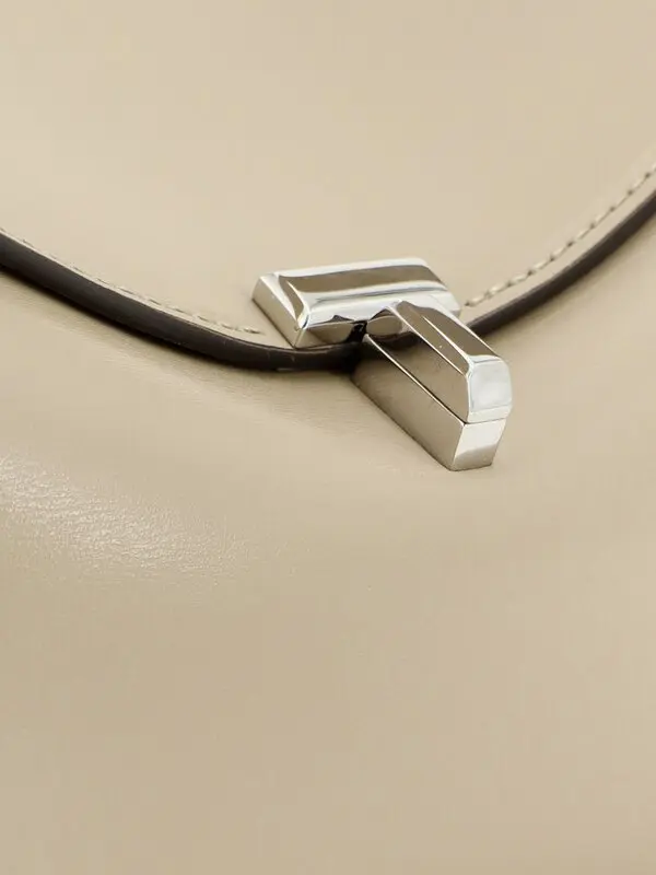 TOTEME Tlock Hammered Leather Crossbody Bag - Beige