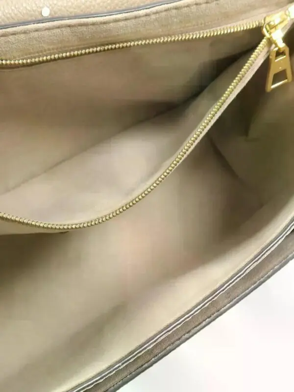LOUIS VUITTON Pm Monogram Empreinte Vavin Shoulder Bag - Neutrals