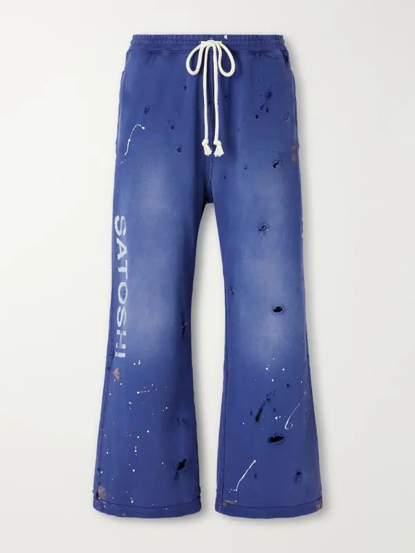 SATOSHI NAKAMOTO Luke Logo-printed Paint-splattered Distressed Cotton-jersey Drawstring Sweatpants