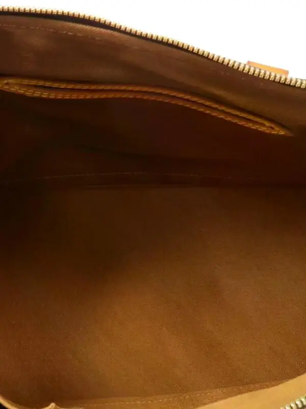 LOUIS VUITTON Alma Monogram Handbag