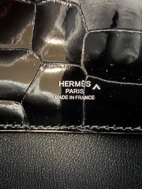 Hermès Kelly Cut Shiny Porosus Palladium Hardware