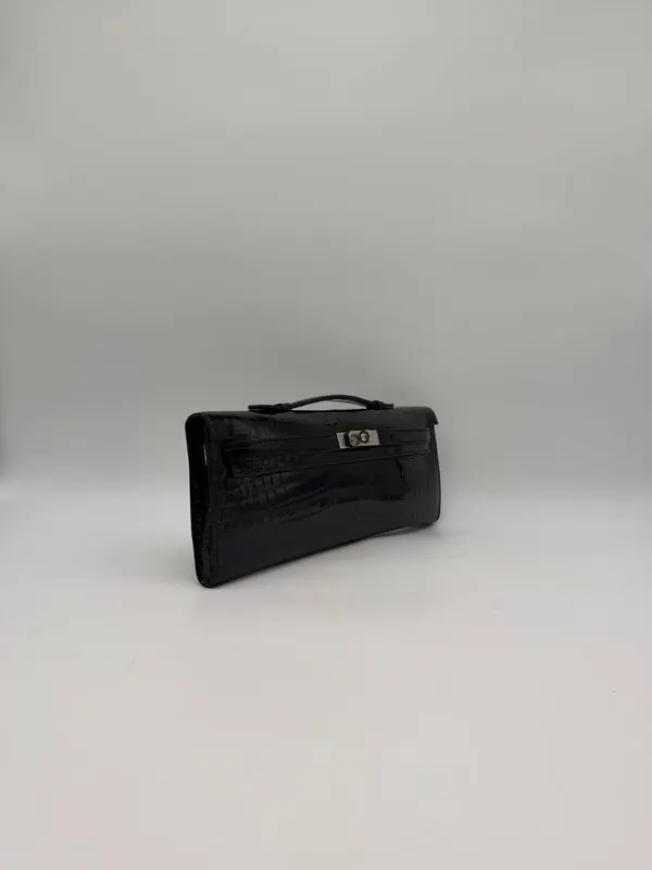 Hermès Kelly Cut Shiny Porosus Palladium Hardware