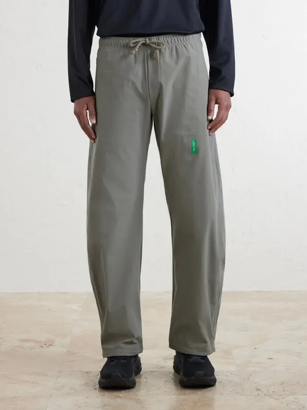 DISTRICT VISION Barrel-leg Logo-appliquéd Shell Track Pants