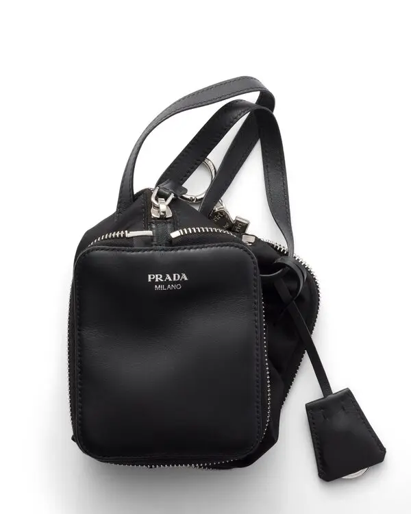 Prada Re-nylon And Leather Foldable Mini Duffel Bag