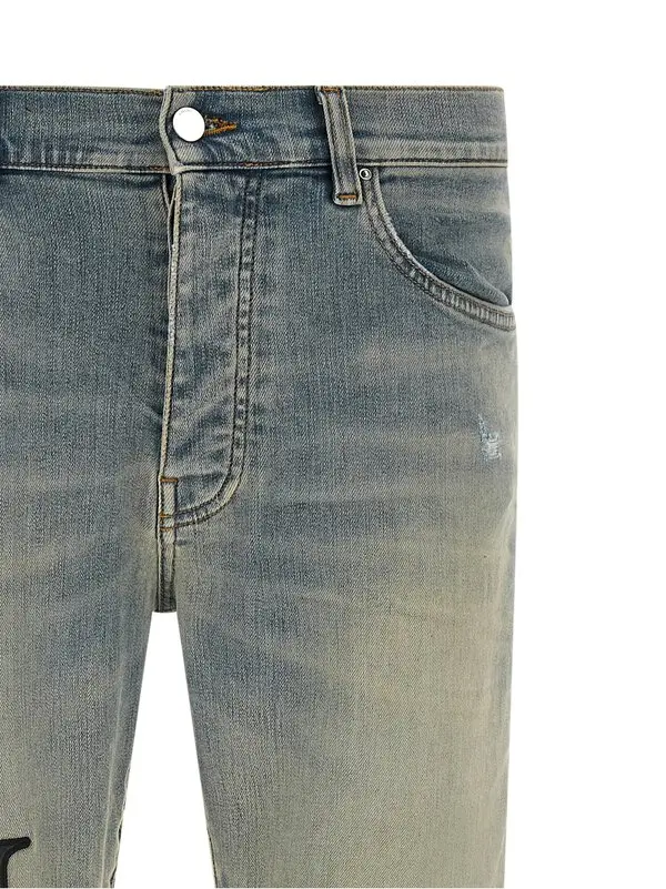 Amiri Staggered Logo' Jeans - Blue