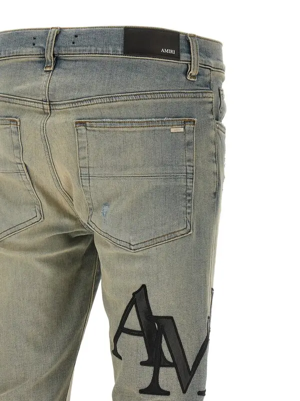 Amiri Staggered Logo' Jeans - Blue