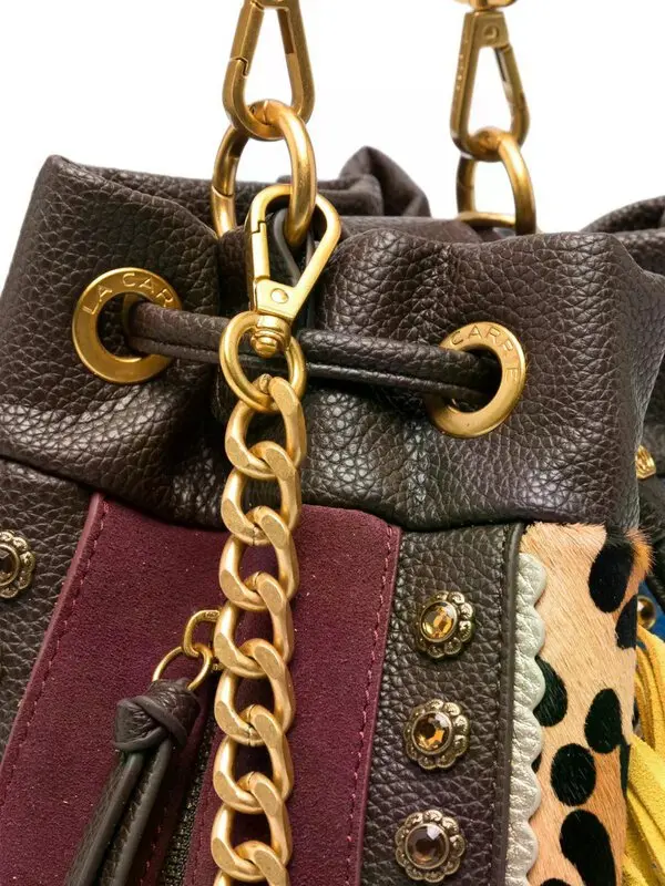 LA CARRIE Jungle Fringe-trimmed Studded Bucket Bag