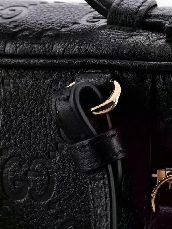 Gucci Emblem Top Handle Vanity Bag Gg Embossed Leather Small Shoulder Bag