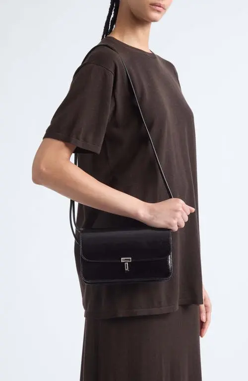 TOTEME T-lock Grained Patent Leather Crossbody Bag - Black