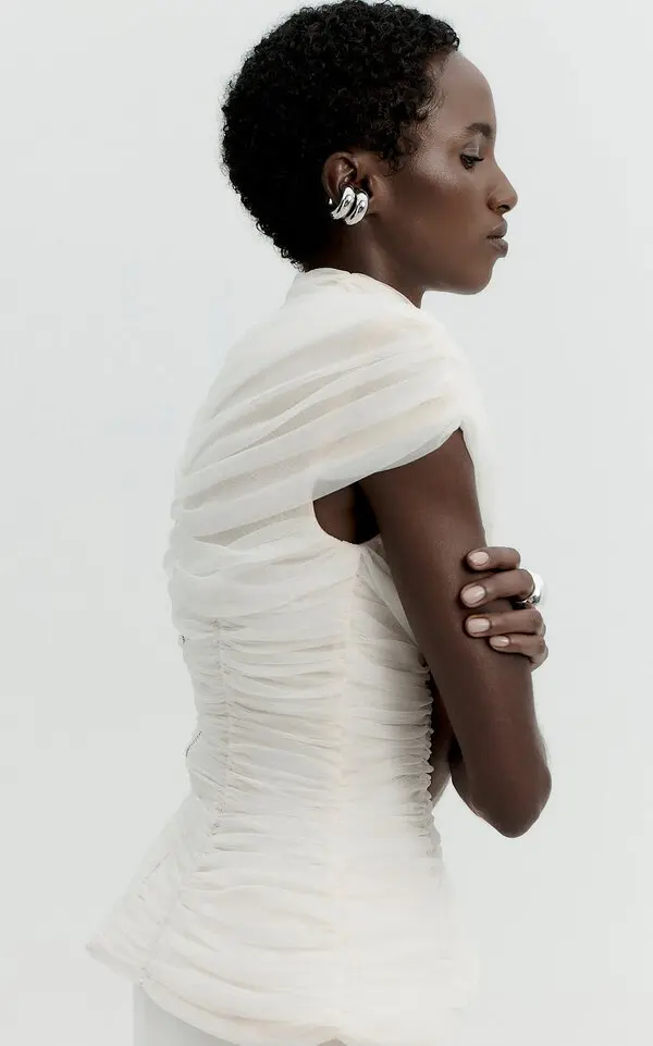 DE LA VALI Lavande High-neck Peplum Top - Ivory