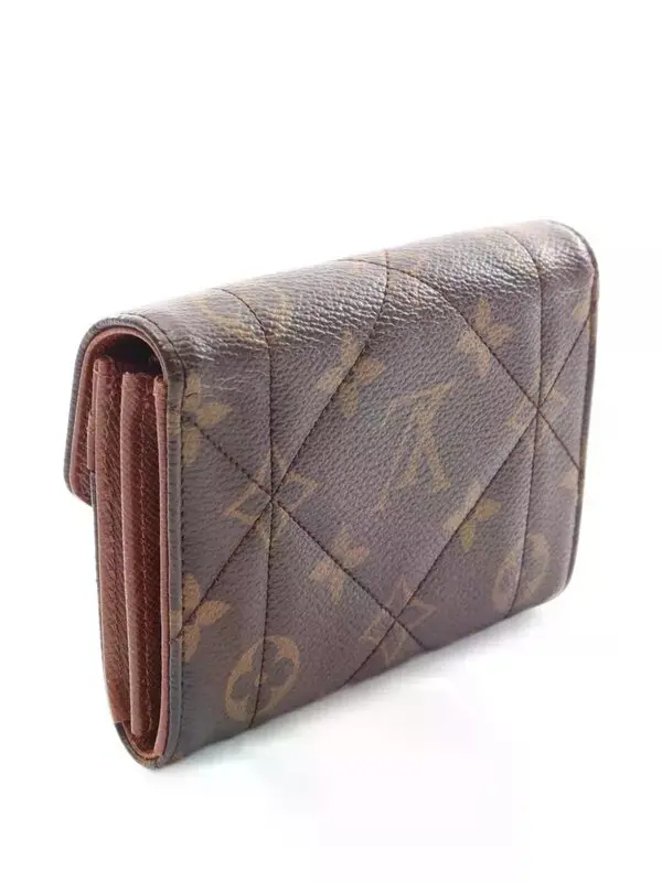 LOUIS VUITTON 2009 Monogram Etoile Bi-fold Wallet