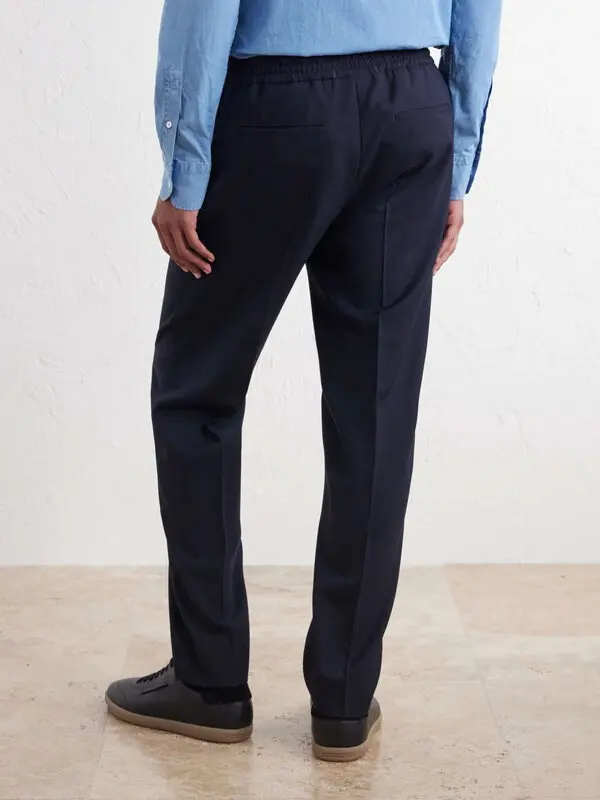 Zegna Tapered Pleated Wool-canvas Trousers