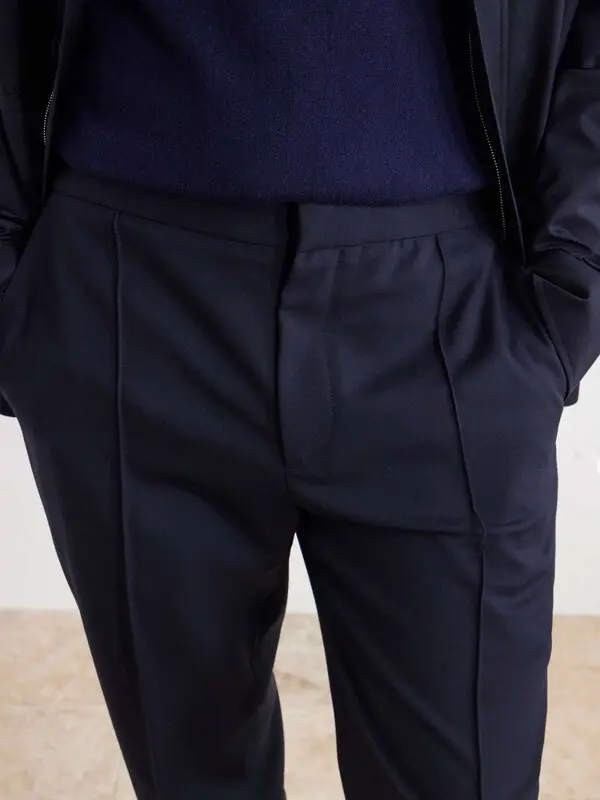 Zegna Tapered Pleated Wool-canvas Trousers