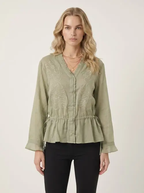 MODENAIRE Embroidered Ruffle Trim Blouse With Drawstring Waist And Flared Cuffs