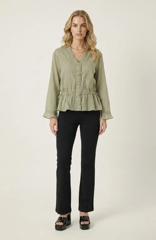 MODENAIRE Embroidered Ruffle Trim Blouse With Drawstring Waist And Flared Cuffs