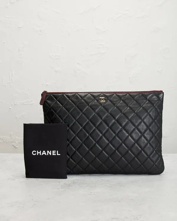 FWRD RENEW Chanel Lambskin O Case Clutch - Black