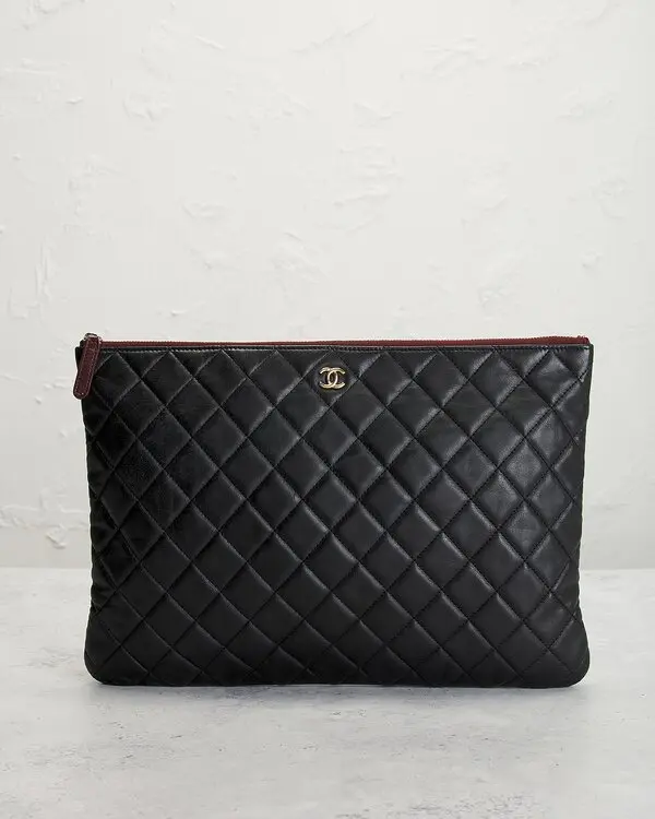 FWRD RENEW Chanel Lambskin O Case Clutch