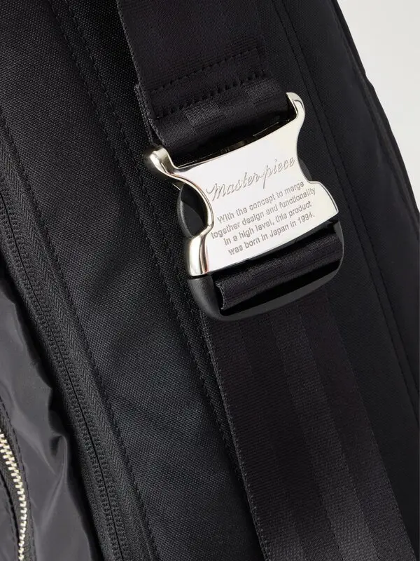 MASTER-PIECE CO Lightning Leather-trimmed Shell Sling Backpack