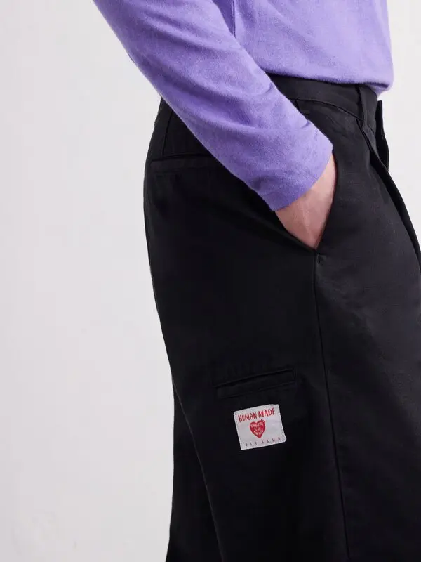 HUMAN MADE Tapered Pleated Cotton-canvas Trousers